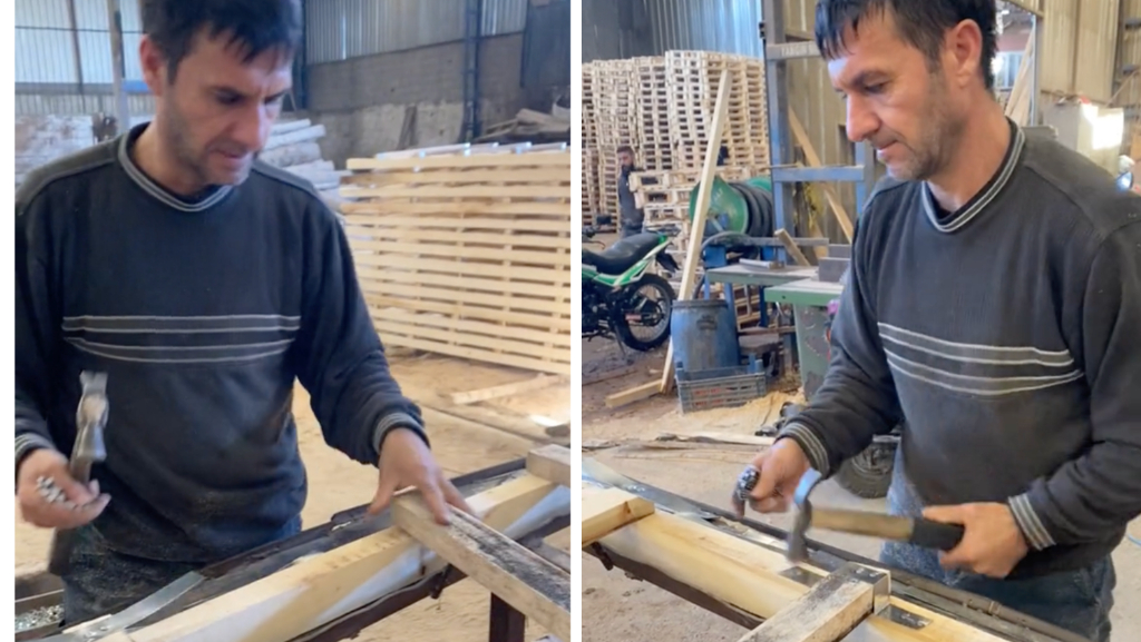 Man Speedily Hammers Nails in a Rhythmic Manner