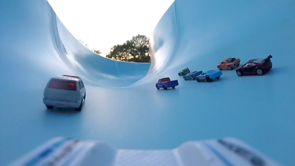 Exhilarating POV Footage of Hot Wheels Toy Cars Racing Down an Empty ...