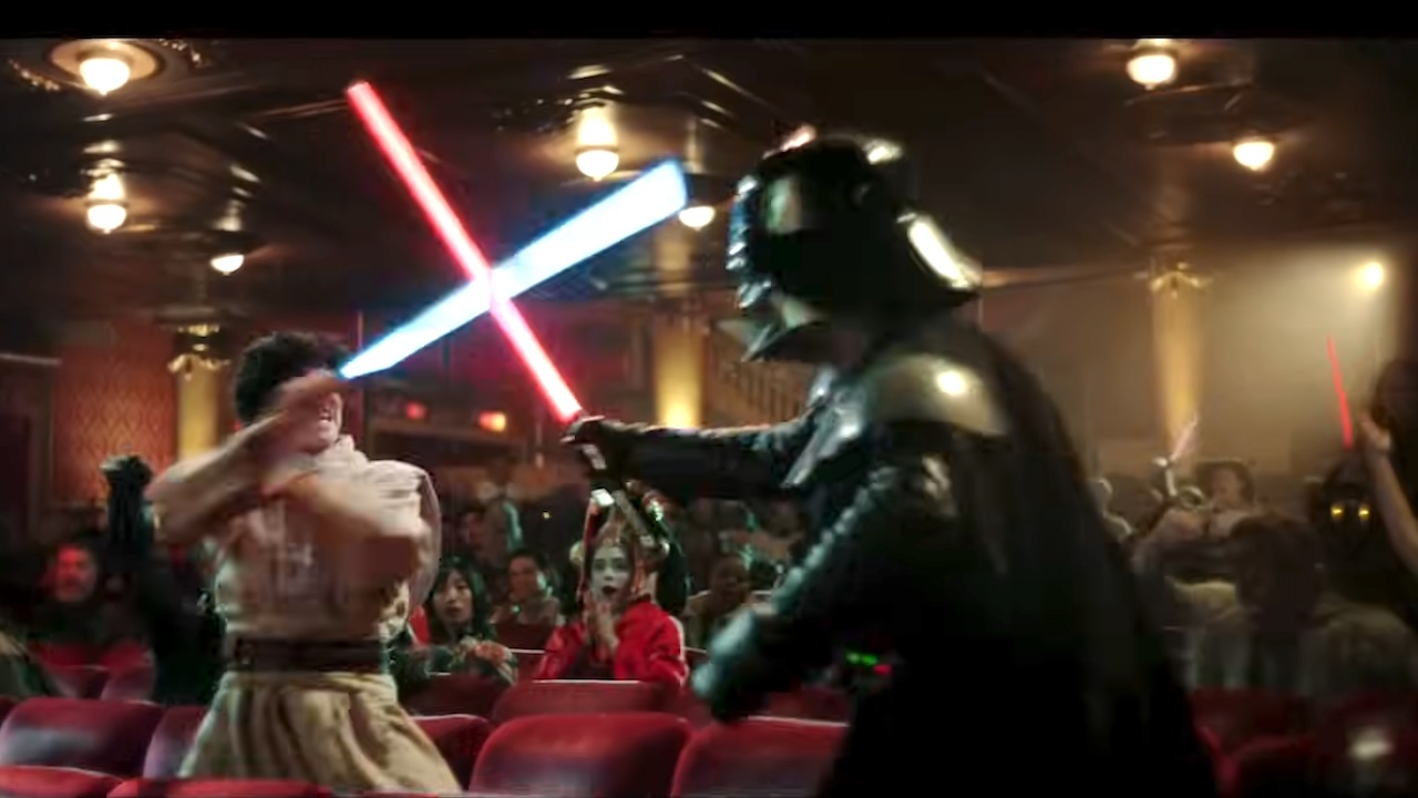 Father and Son Battle With Light Saber Coca-Cola Bottles During a 'Star ...