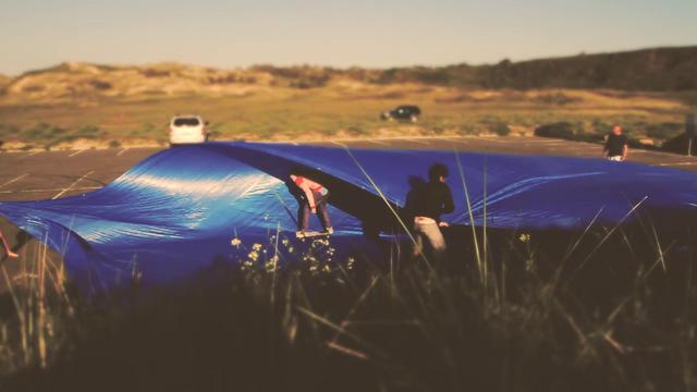 Blue Tarp Skateboard Surfing