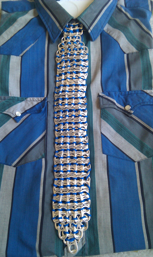 Man Makes Quirky Clothing Out of Aluminum Pull Tabs From Drink Cans