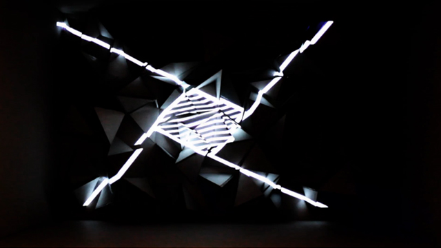 A Mesmerizing Video Showing Animated Light Projected on a Jagged ...
