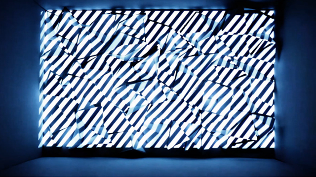 A Mesmerizing Video Showing Animated Light Projected on a Jagged ...